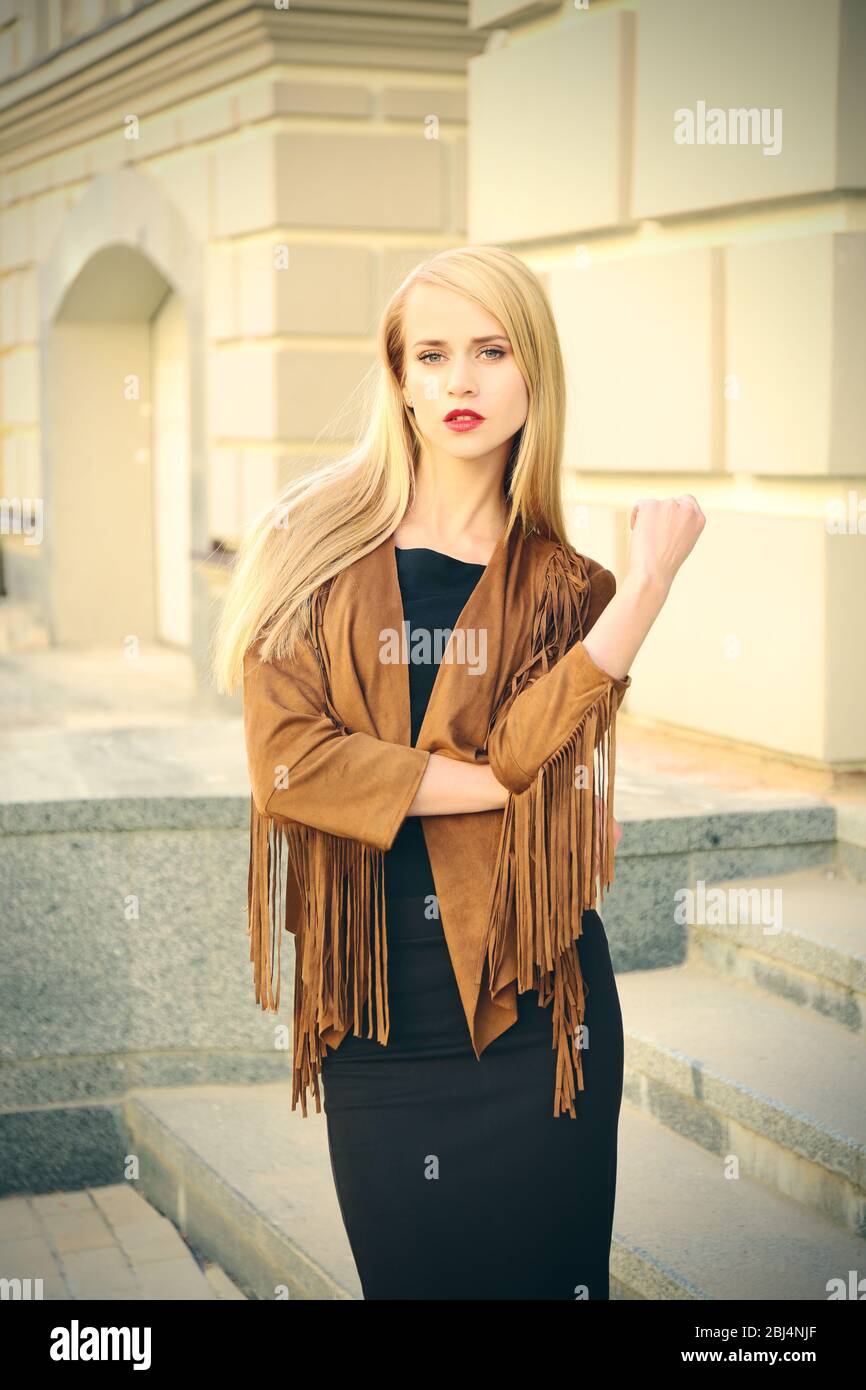 Elegant lady in the street of old city Stock Photo - Alamy