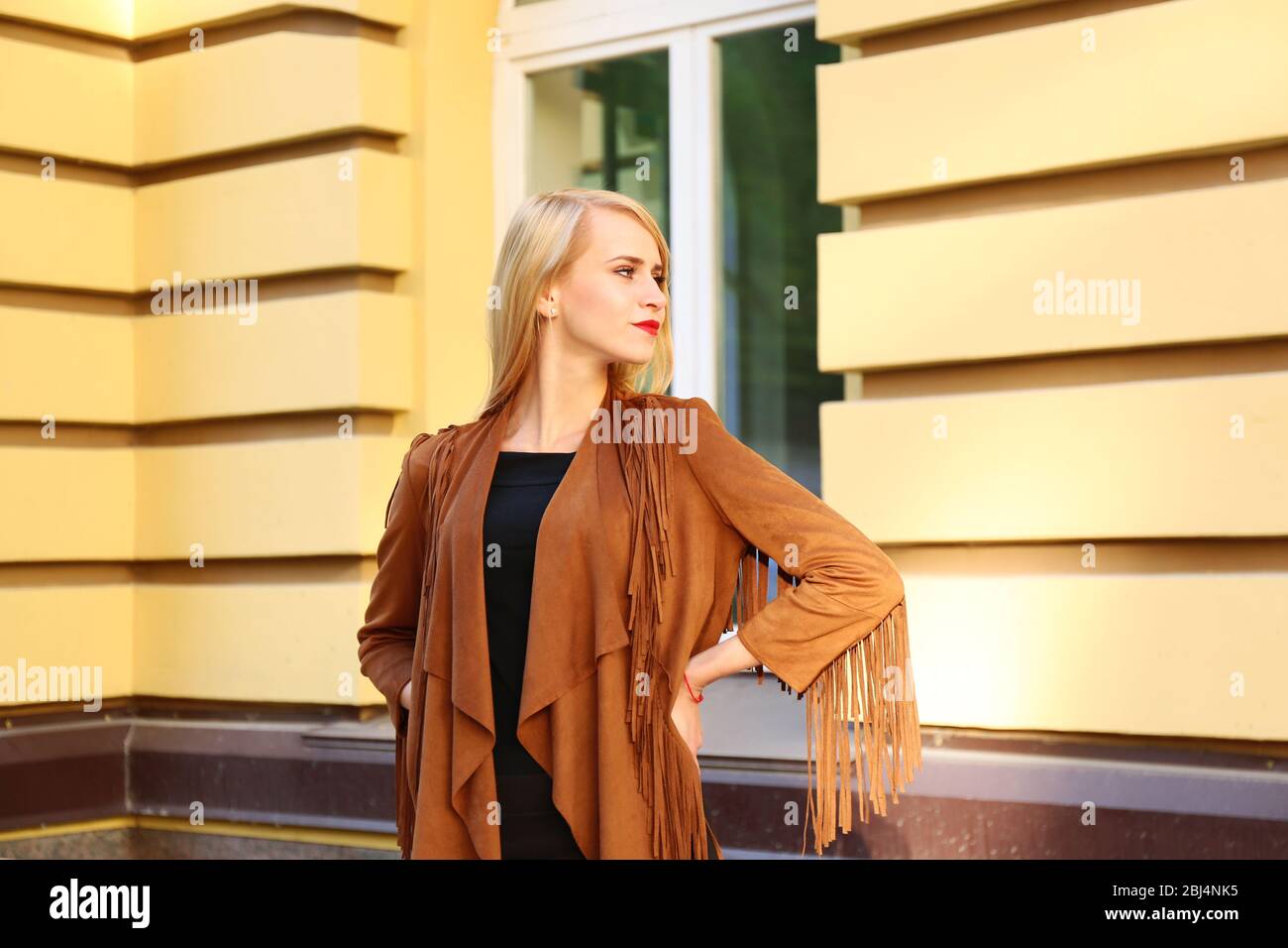 Elegant lady in the street of old city Stock Photo - Alamy