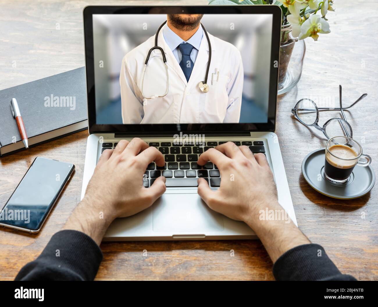 Telemedicine, online health care concept. Doctor GP with a stethoscope ...