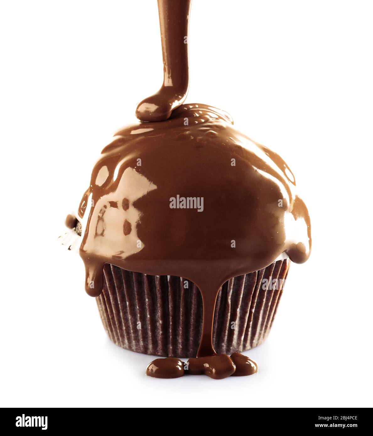 Delicious cupcake with melted chocolate topping, isolated on white ...
