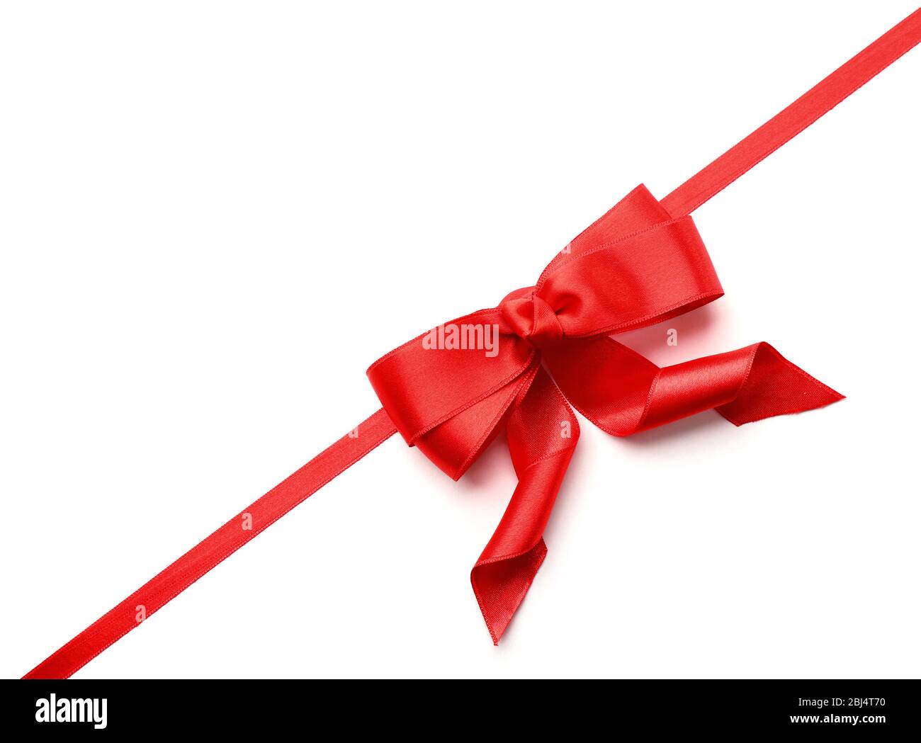 Shiny red ribbon with bow isolated on white Stock Photo - Alamy