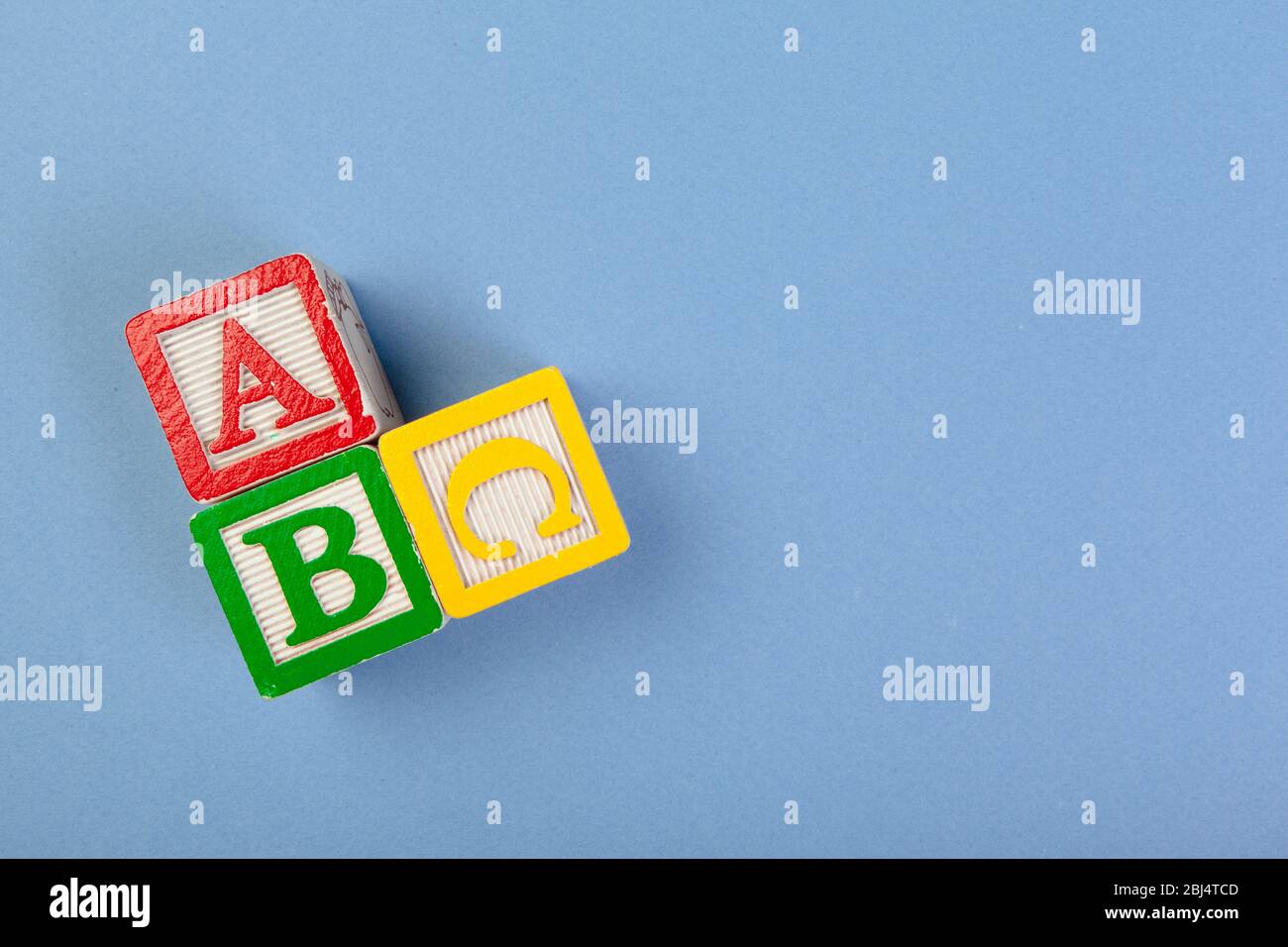 Alphabet blocks ABC close up, education concept Stock Photo - Alamy