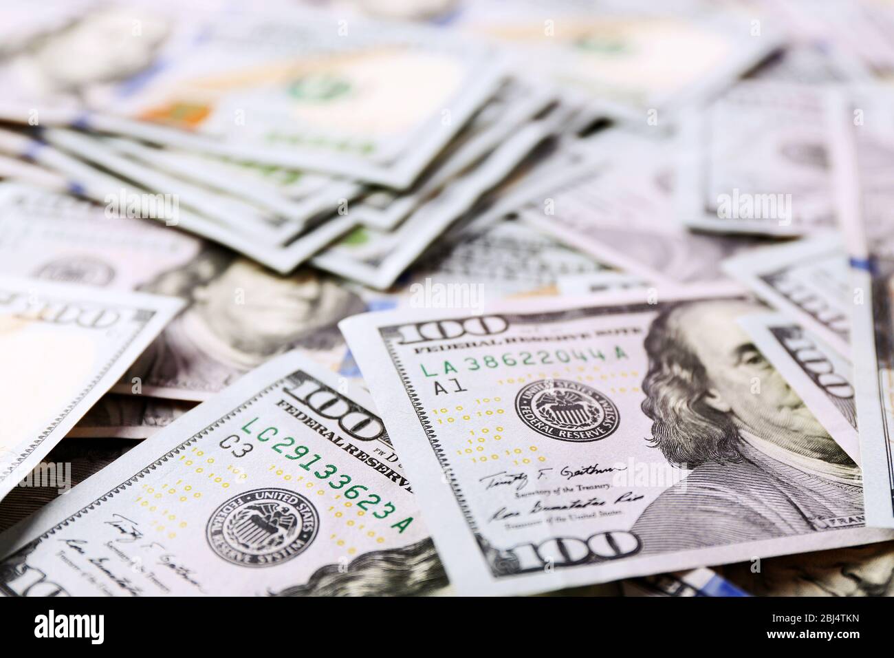 Many hundred dollars cash money as background Stock Photo - Alamy