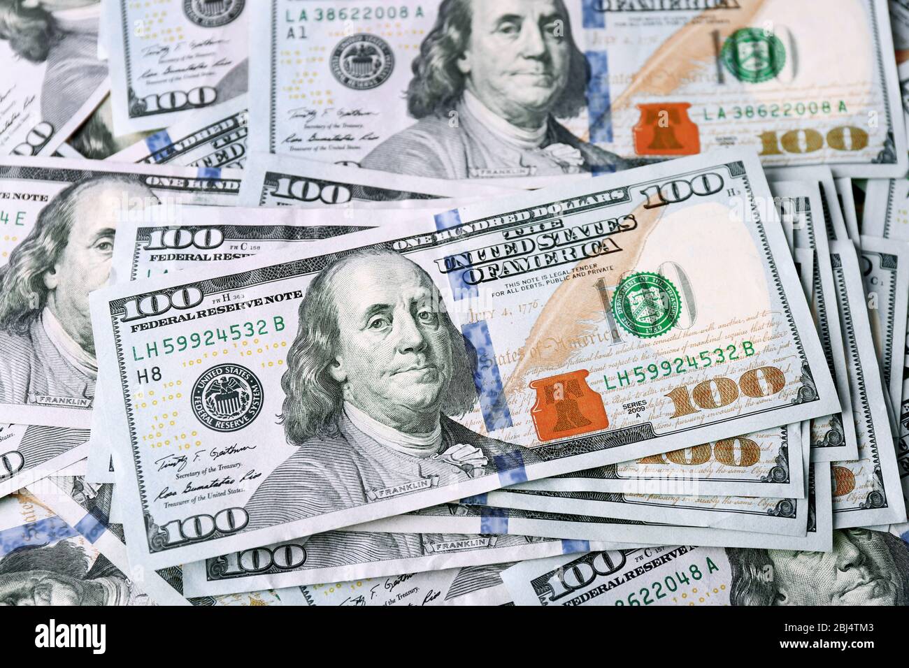 Many hundred dollars cash money as background Stock Photo - Alamy