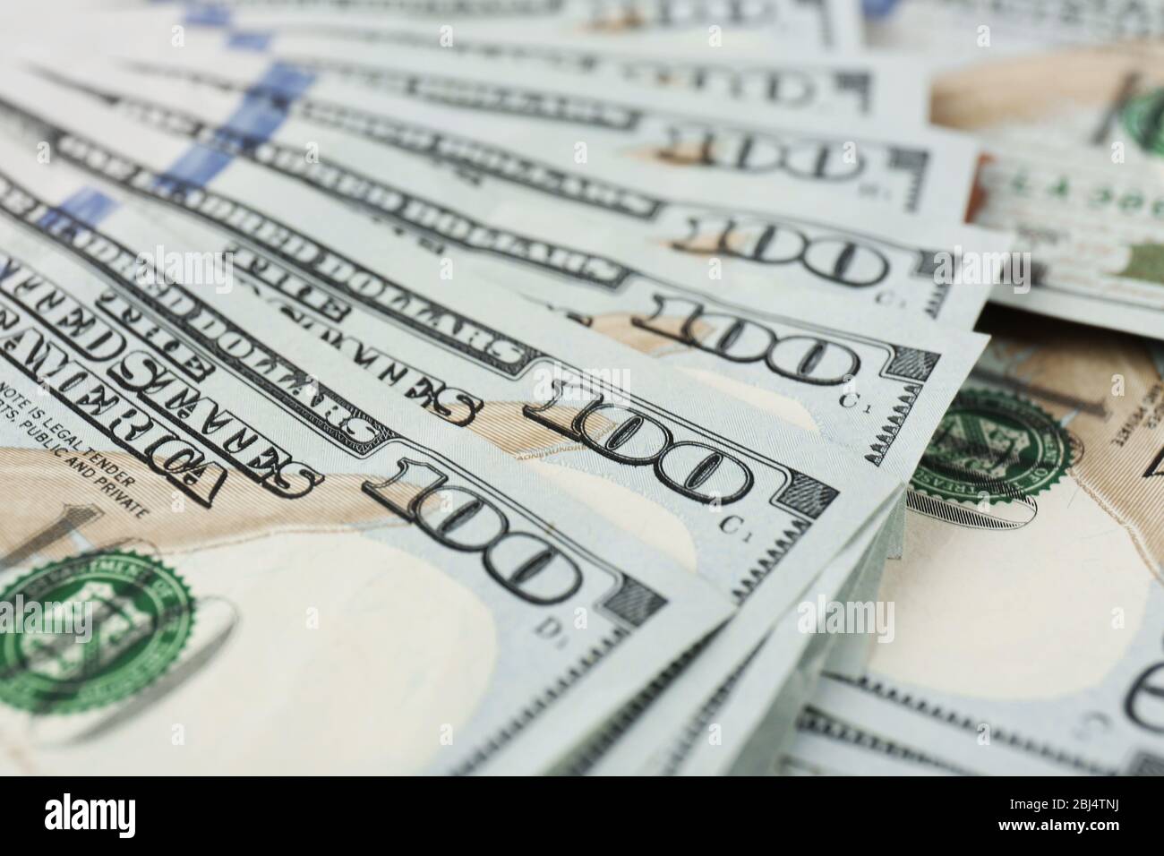 Fan shaped hundred dollars cash money as background Stock Photo - Alamy