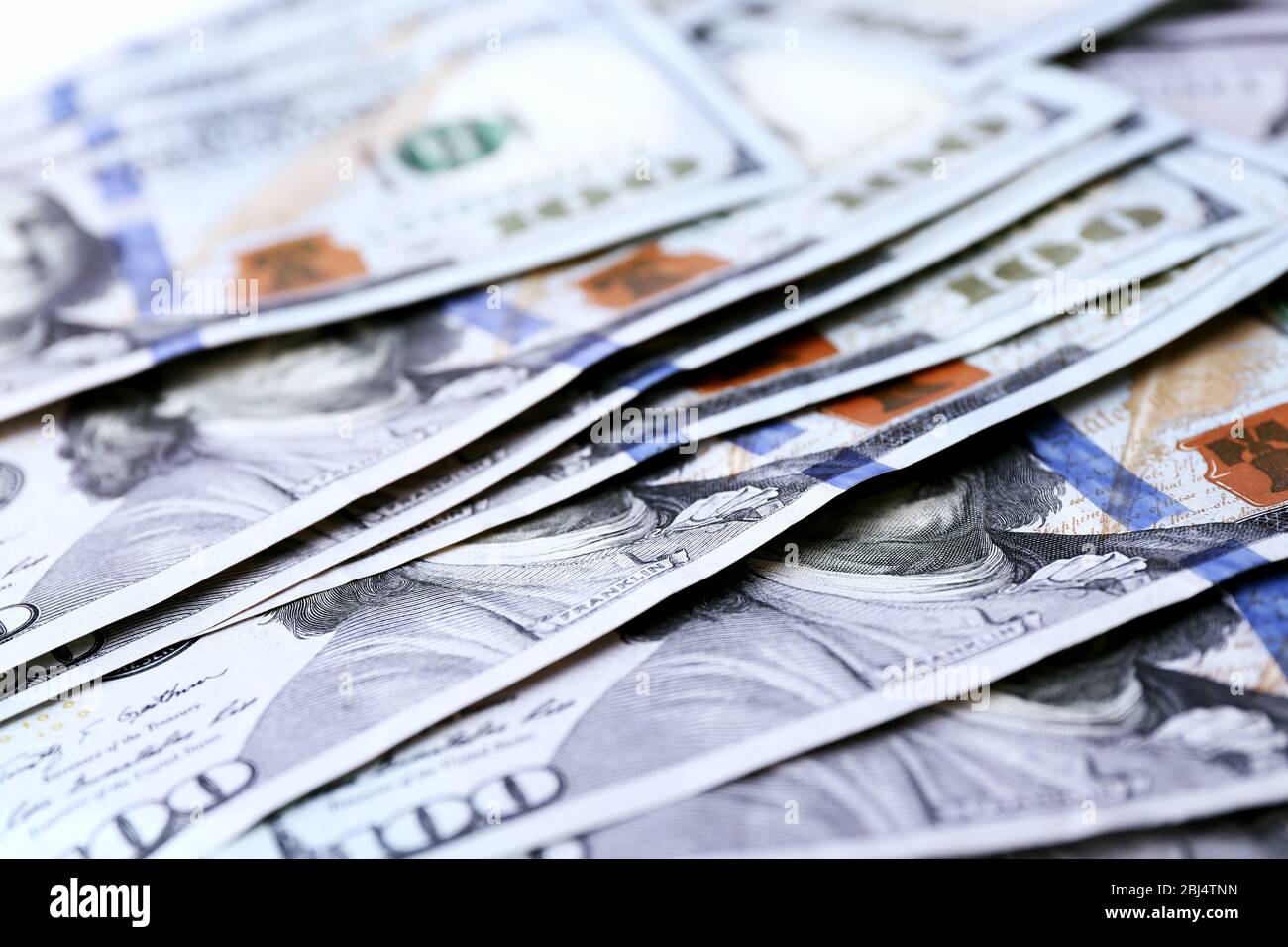 Many hundred dollars cash money as background Stock Photo - Alamy