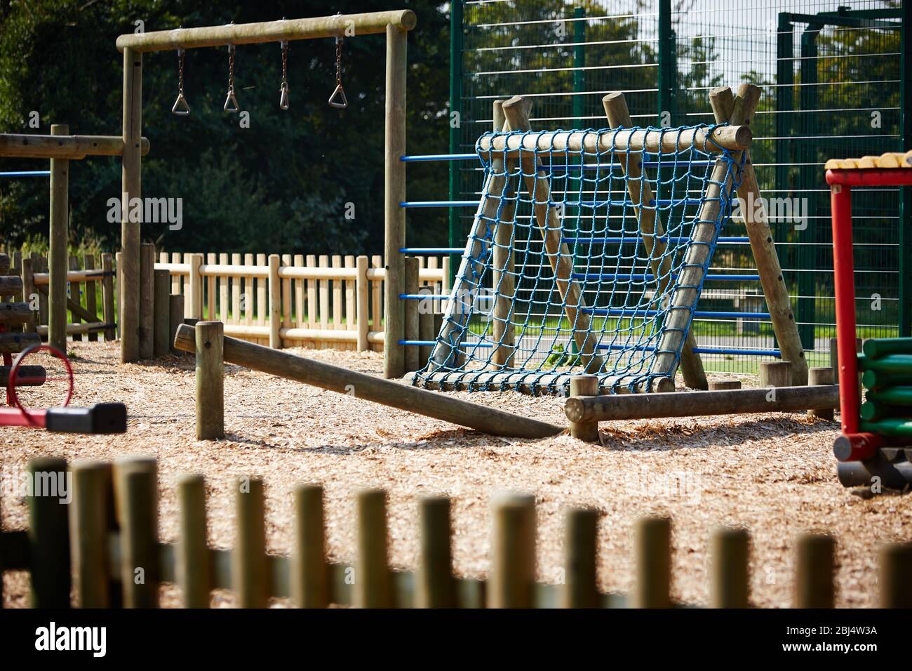 Shot of a children playground in a park during early summer Stock Photo ...