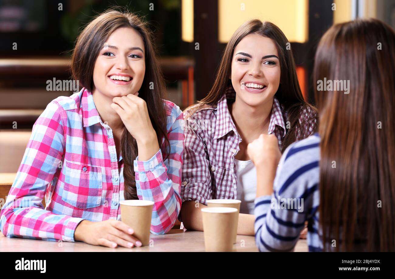 Beautiful girls in cafe Stock Photo - Alamy