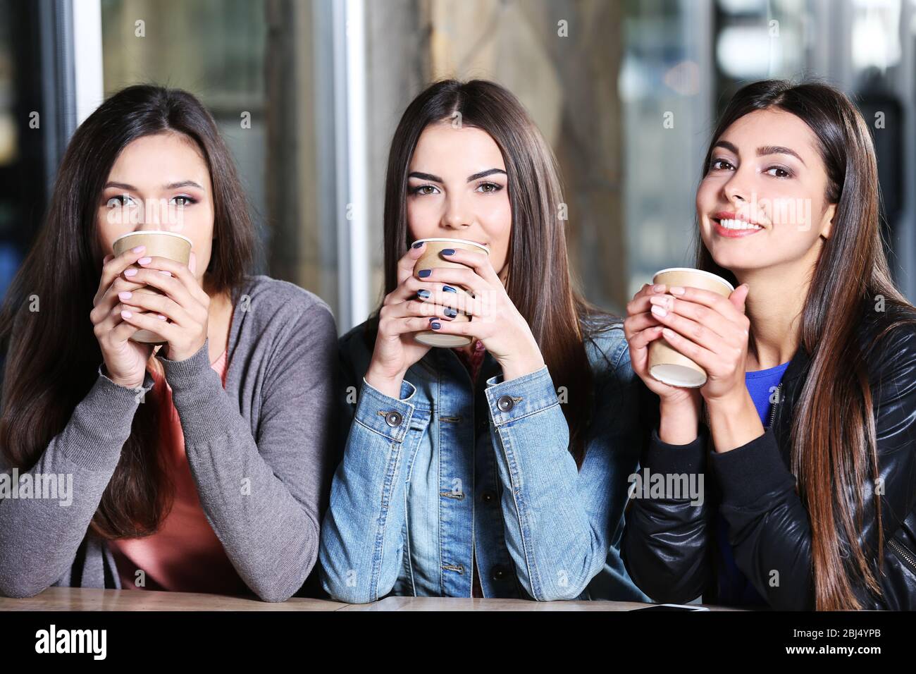 Best friends together sitting at cafes terrace Stock Photo - Alamy