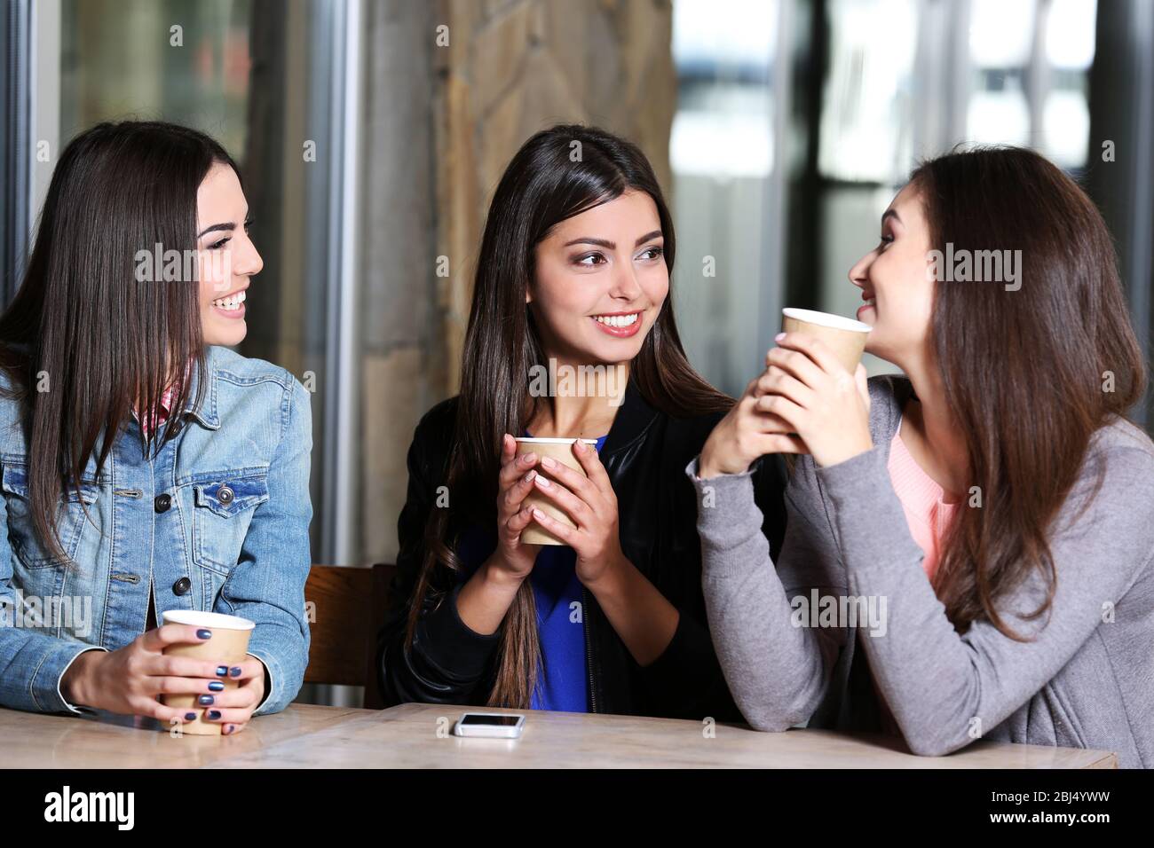Best friends speaking together at cafes terrace Stock Photo - Alamy
