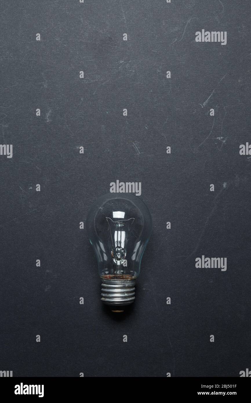 Light bulb on gray background, top view. Creative Idea Concept Stock ...