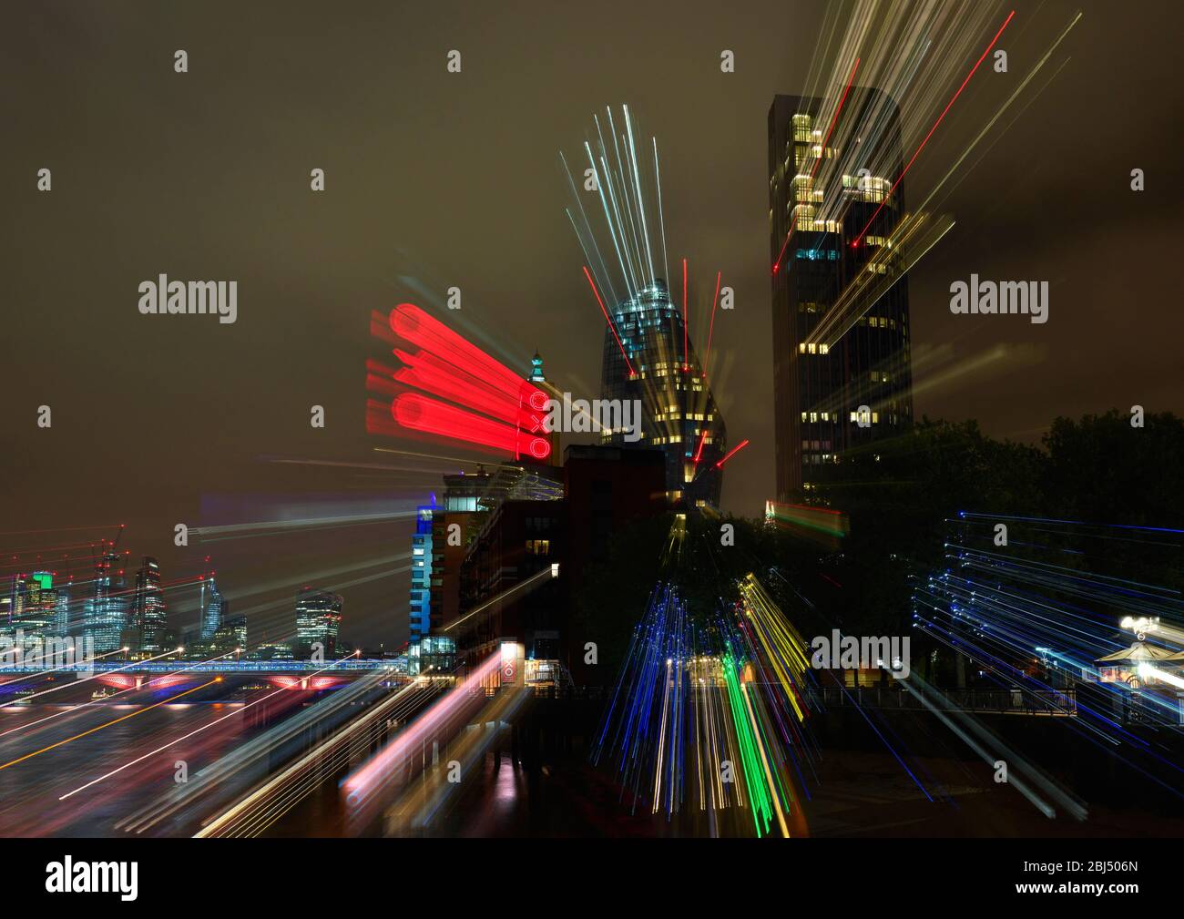 Abstract nighttime image of London's South Bank and City with light ...