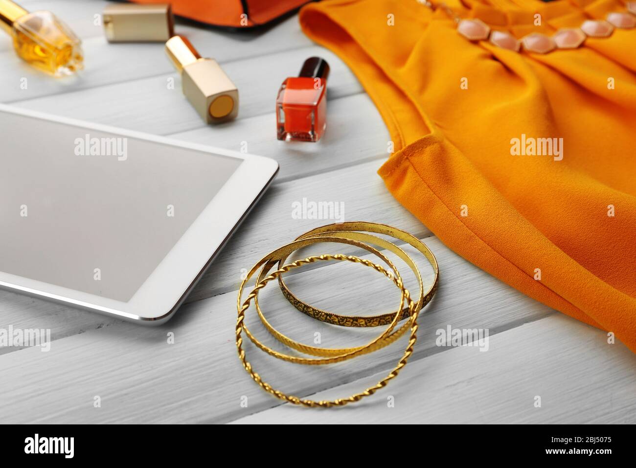 Bright fashion look on wooden background, close up Stock Photo - Alamy
