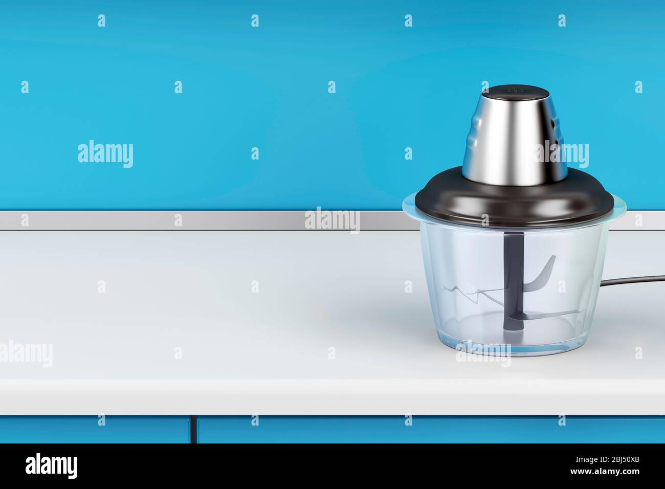 Electric food processor on kitchen table Stock Photo - Alamy