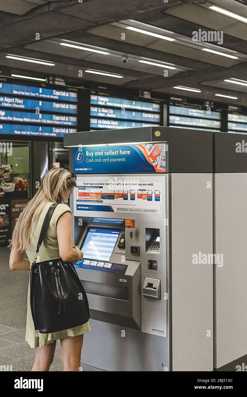 Woman train ticket machine uk hi-res stock photography and images - Alamy