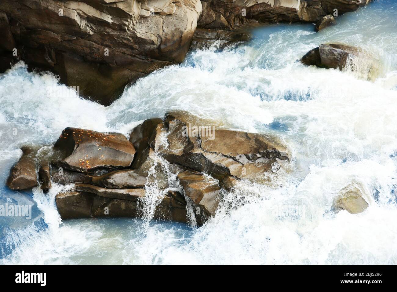 Photography of beautiful waterfall on rocks Stock Photo - Alamy