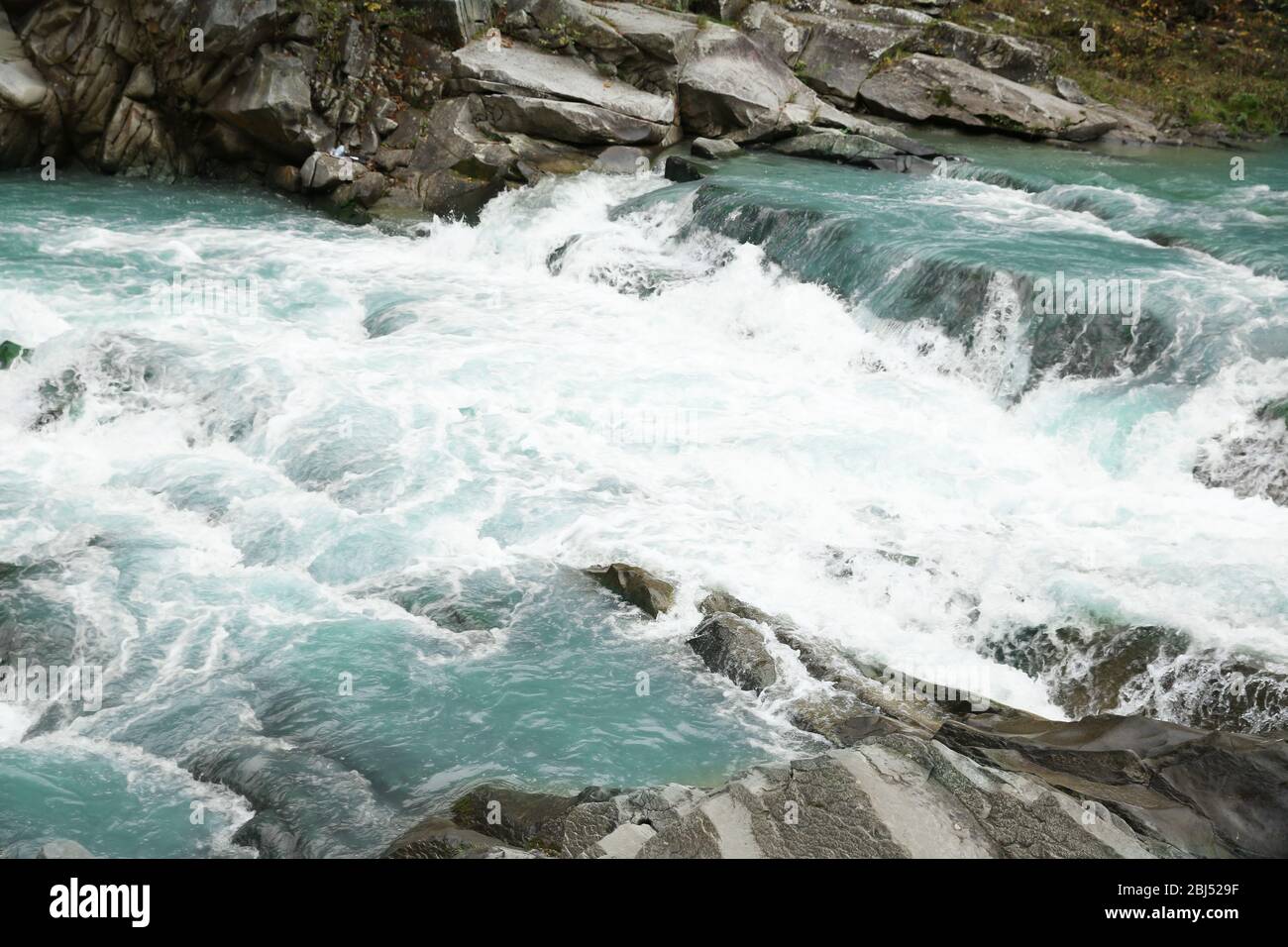 Photography of beautiful waterfall on rocks Stock Photo - Alamy