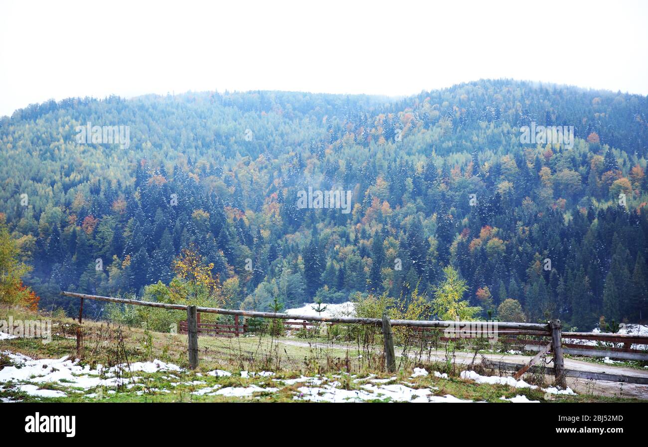 Landscape of village in mountains Stock Photo - Alamy