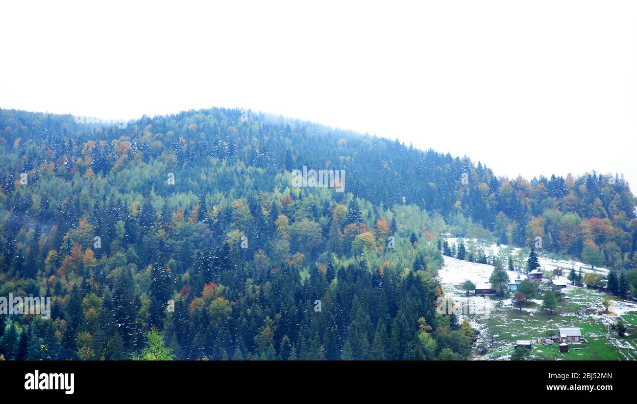 Landscape of village in mountains Stock Photo - Alamy