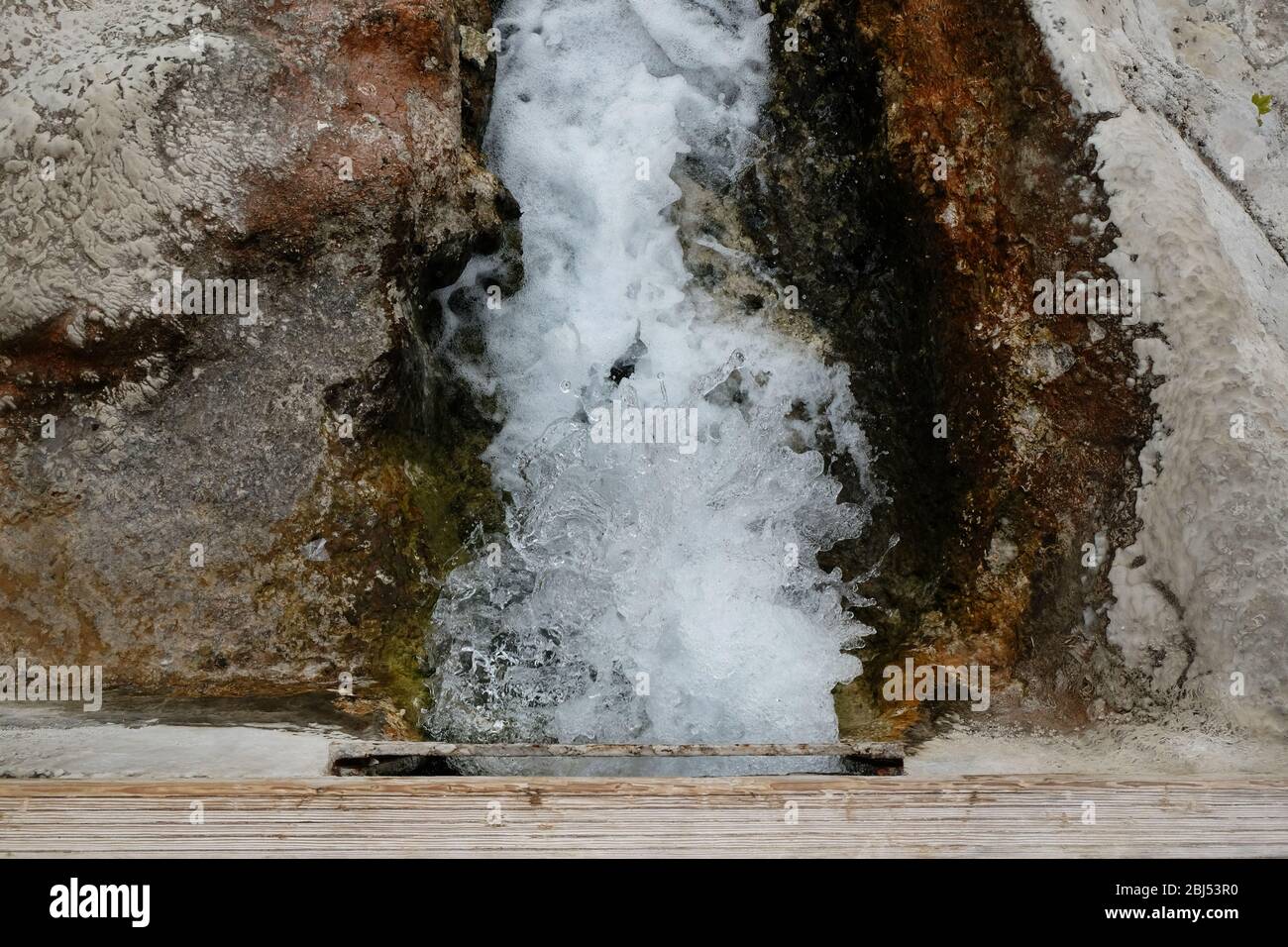 Water flowing from the stones Stock Photo - Alamy