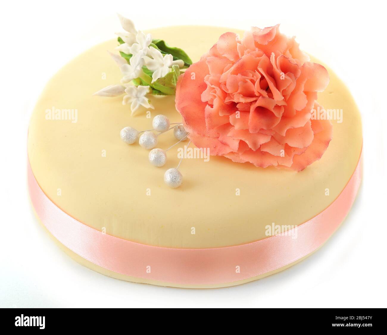 Cake with sugar paste flowers, isolated on white Stock Photo - Alamy