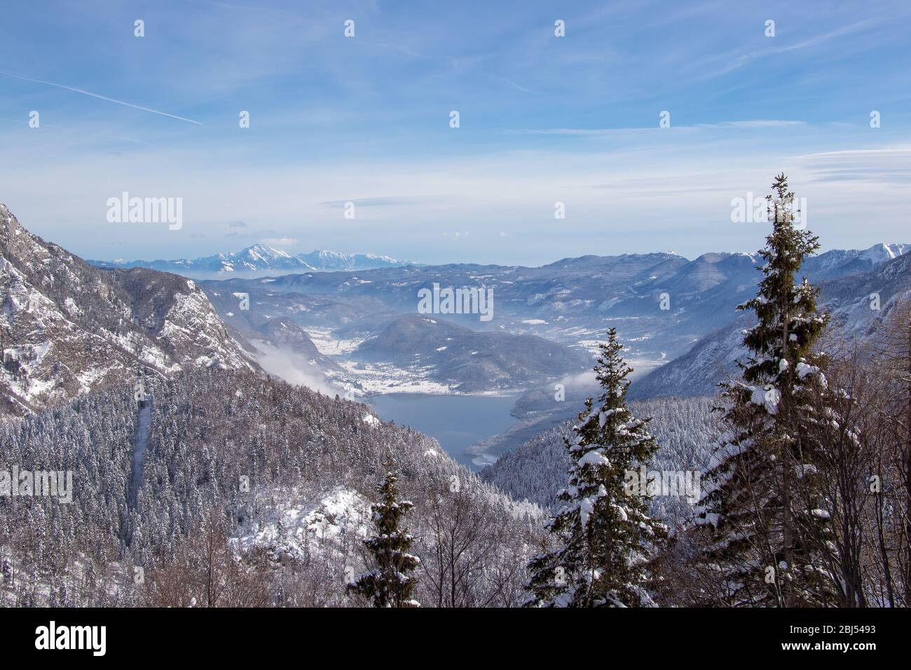 Bohinj lake winter snow covered trees from Komna plateau Stock Photo ...