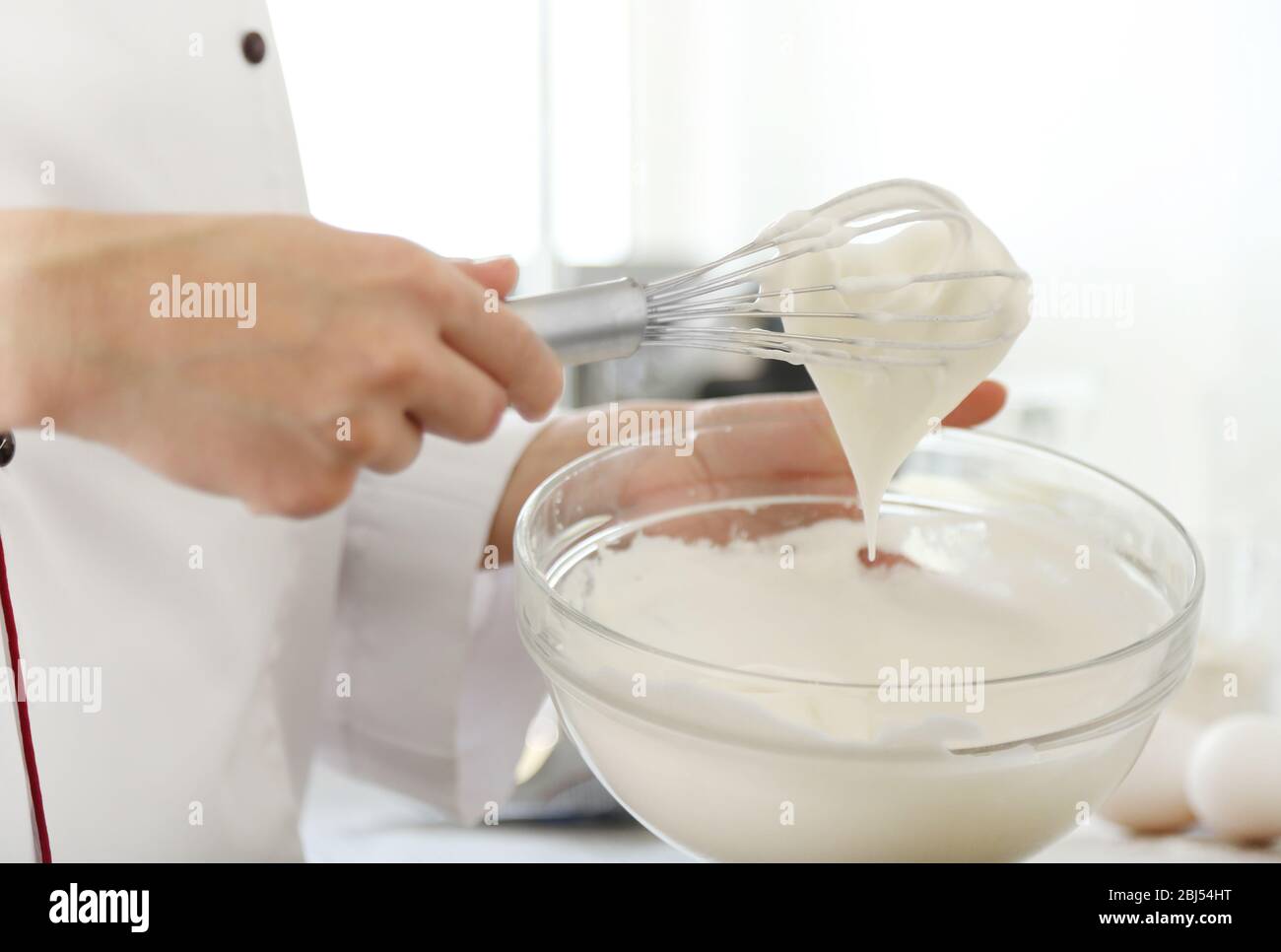 Cooking buttery cream on kitchen Stock Photo - Alamy
