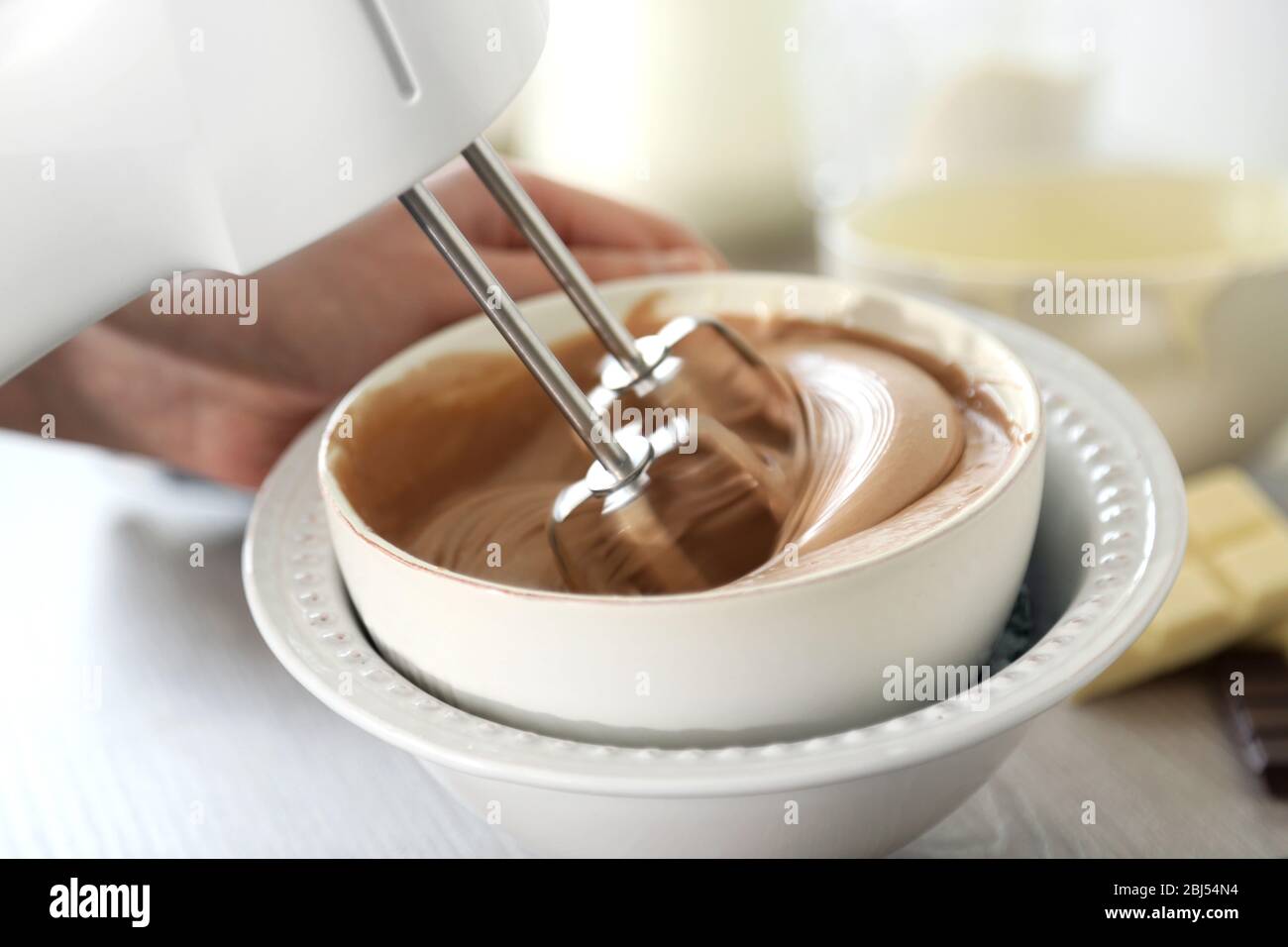 Cooking cream on kitchen Stock Photo - Alamy