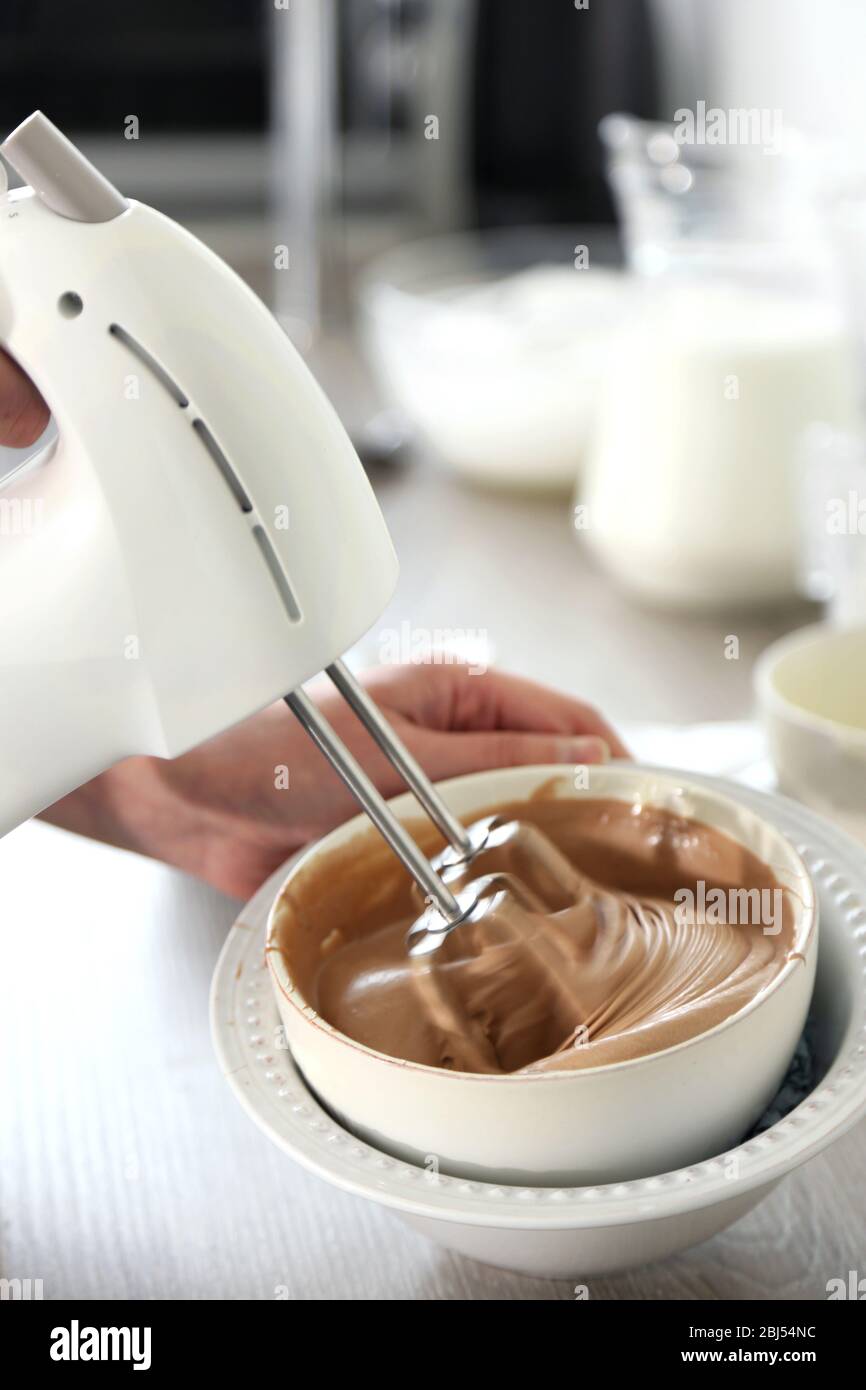 Cooking cream on kitchen Stock Photo - Alamy