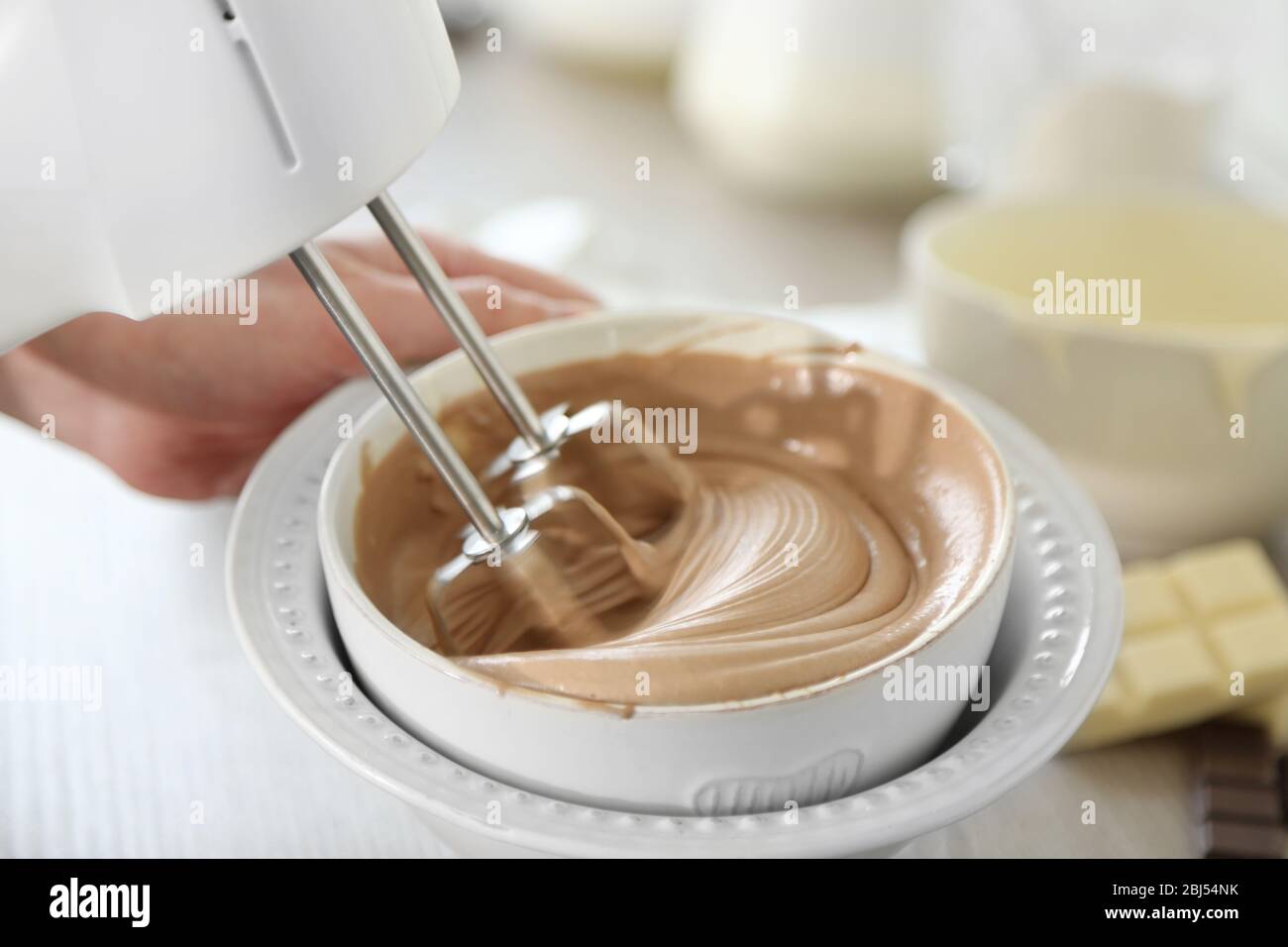 Cooking cream on kitchen Stock Photo - Alamy