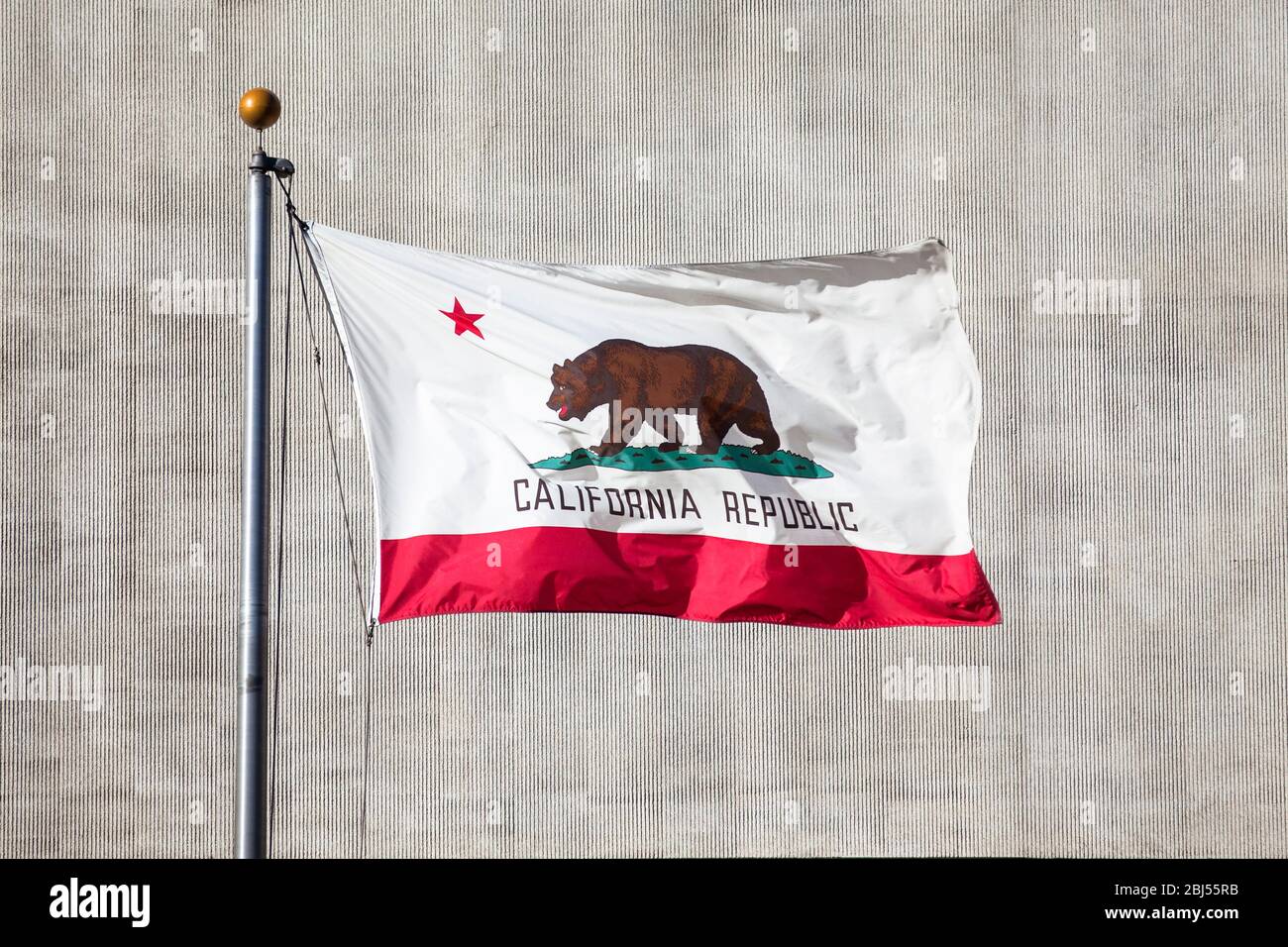 Flag of California flies over Los Angeles USA Stock Photo - Alamy