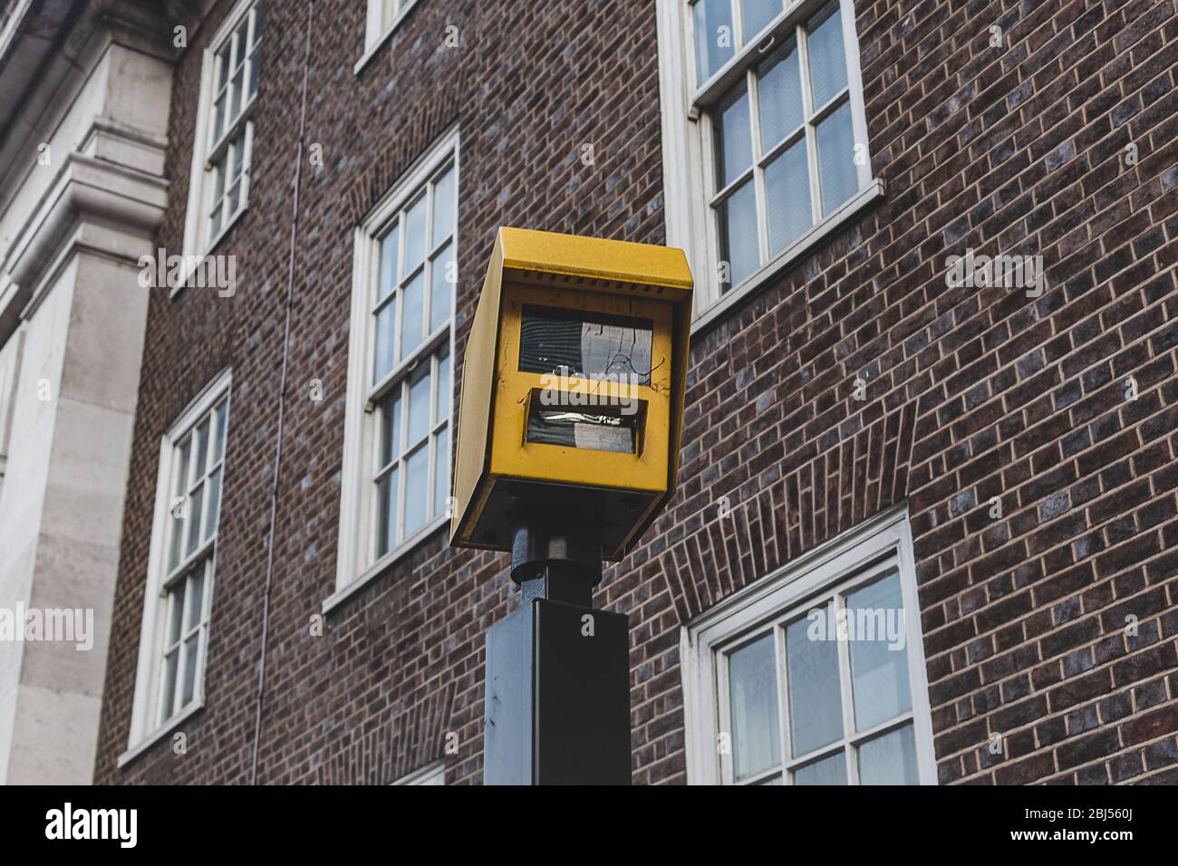 UK static speed or safety camera against brick wall of a building Stock ...