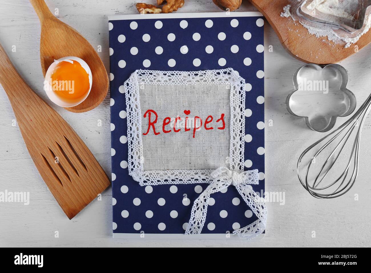 Recipe book on a table with ingredients for baking Stock Photo - Alamy