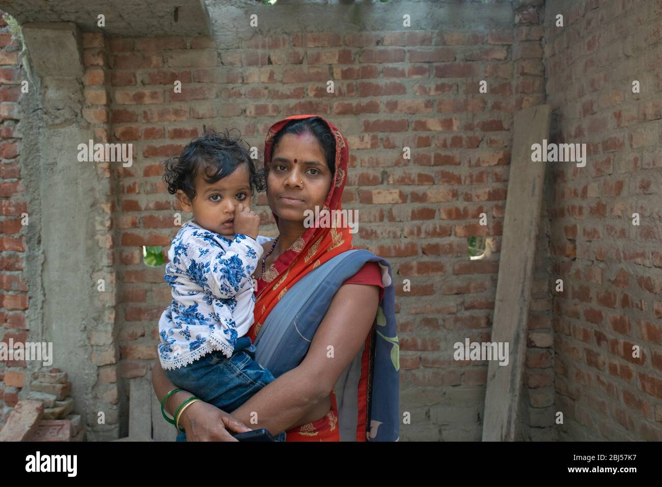 Single mother poverty hi-res stock photography and images - Alamy