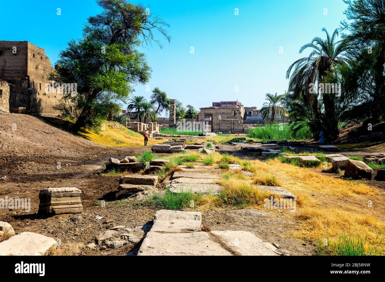 The ruins of Temple of Montu, in El Tod, seen from the old causeway ...