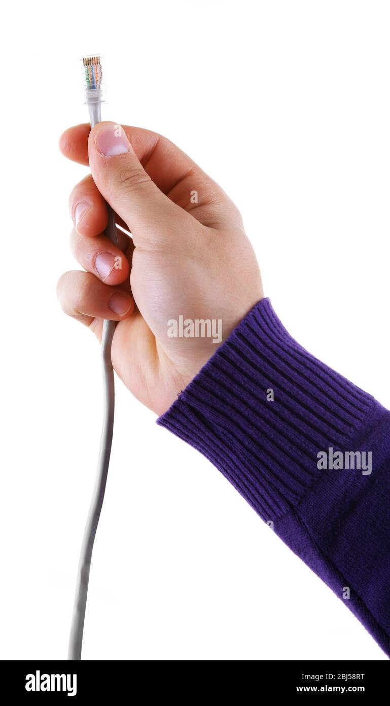 Internet cable in hand isolated on white Stock Photo - Alamy