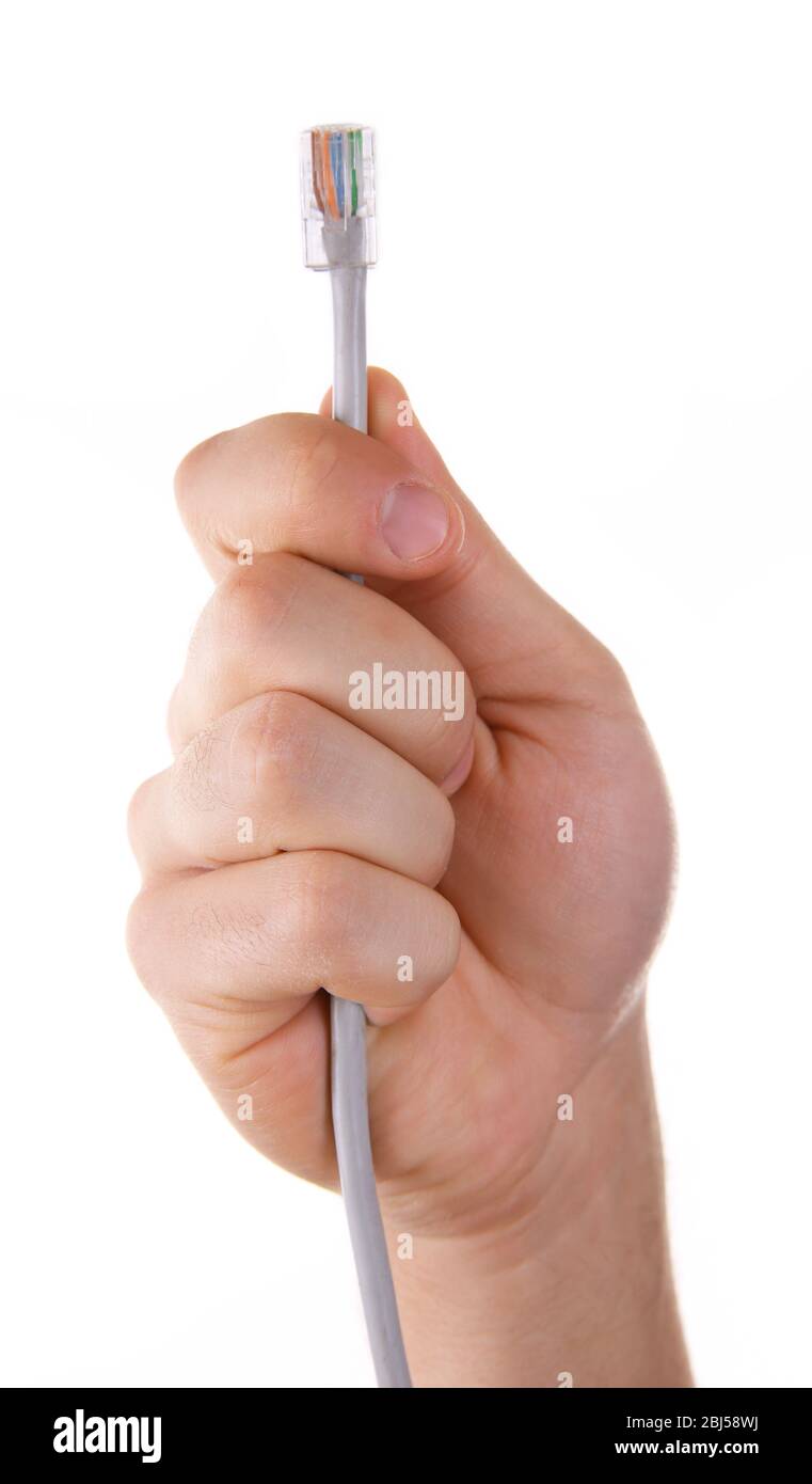 Internet cable in hand isolated on white Stock Photo - Alamy