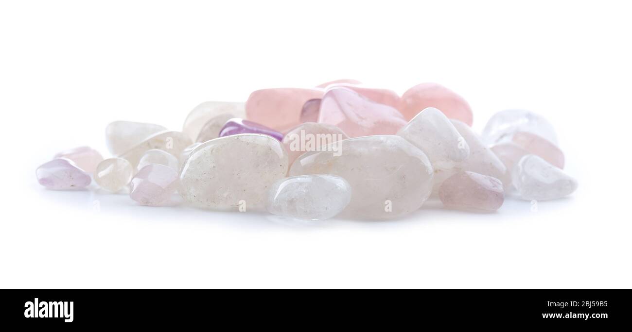 Pink quartz pile isolated on white background Stock Photo - Alamy