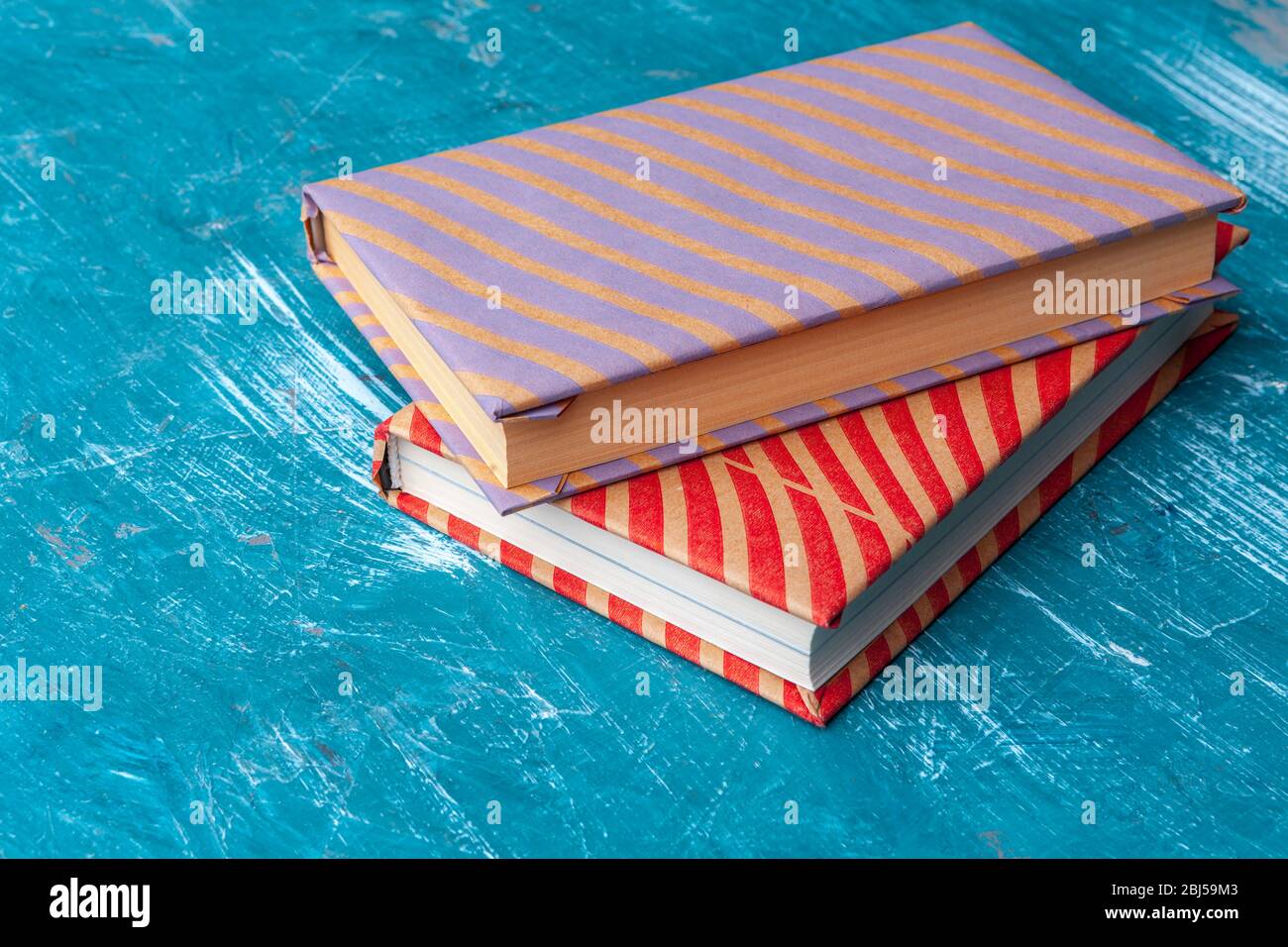 paperback books on a table. Close up Stock Photo - Alamy