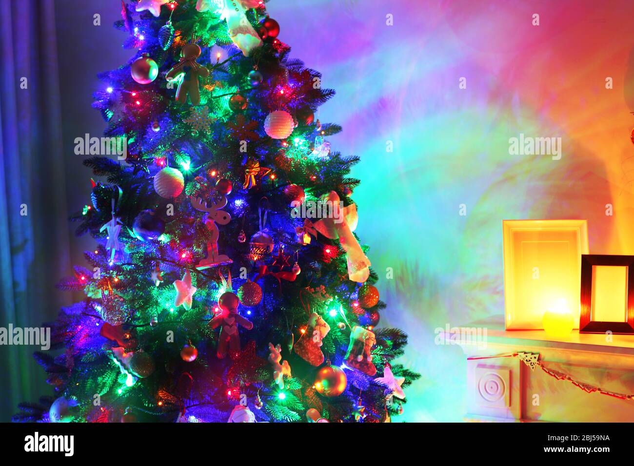 Christmas tree in a room Stock Photo - Alamy