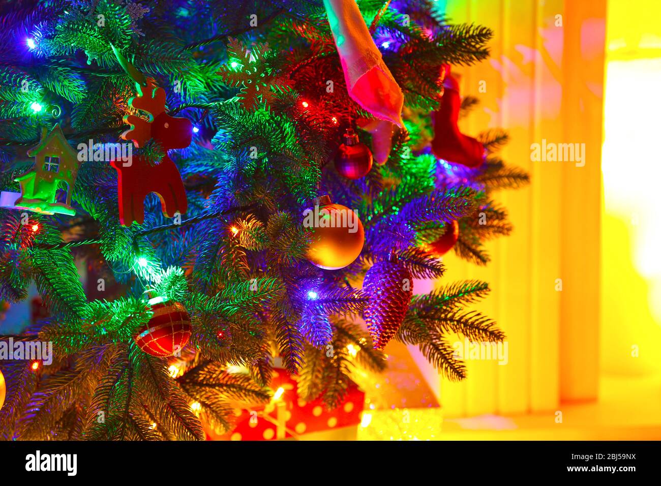 Christmas tree in a room closeup Stock Photo - Alamy