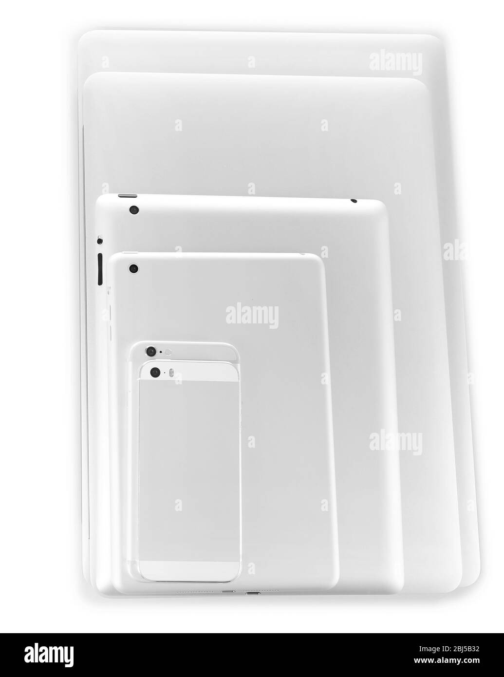 Gadgets on grey background Stock Photo - Alamy