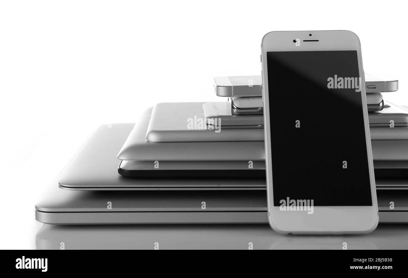 Gadgets isolated on white Stock Photo - Alamy