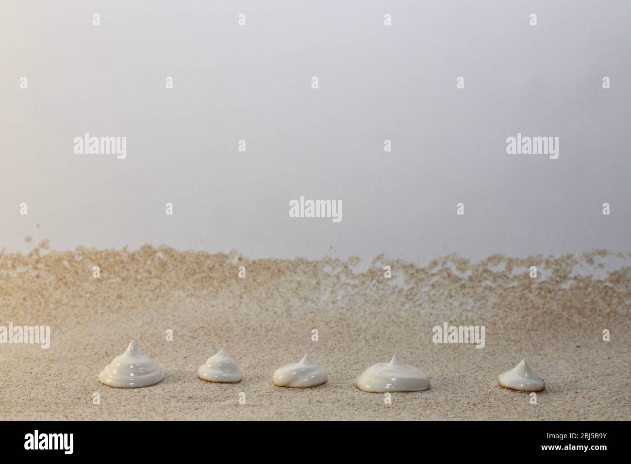 Horizontal background with an embankment of dry sand flour coarse ...