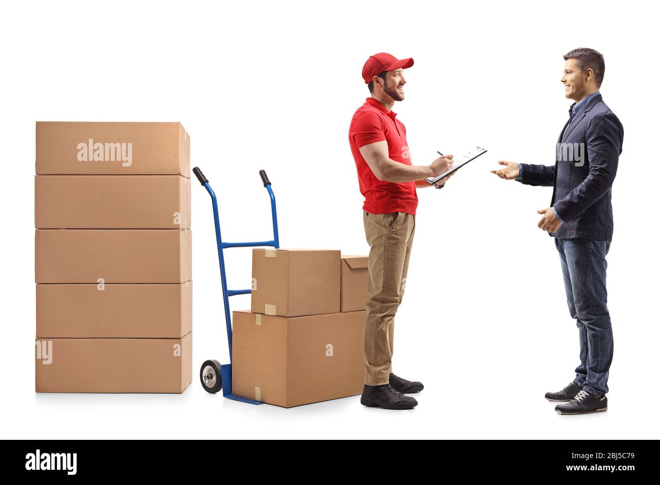 Full length shot of a delivery man with a document handing boxes to a ...