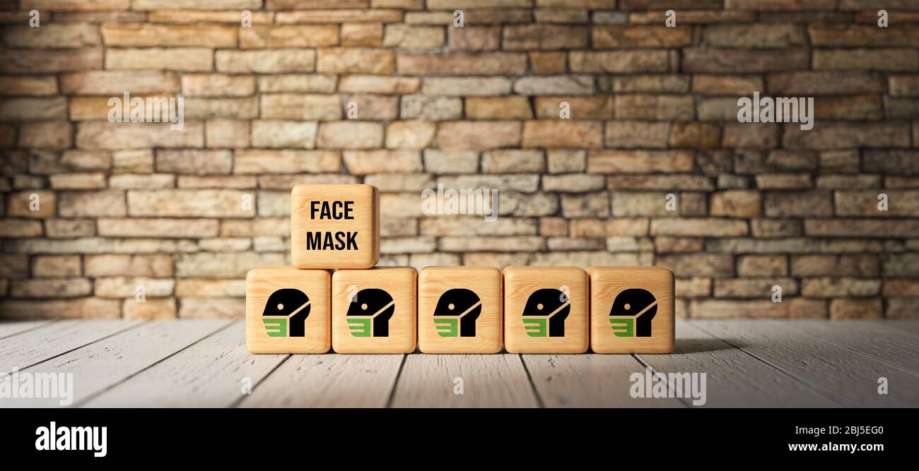 cubes with message FACE MASK in front of a brick wall background - 3D ...