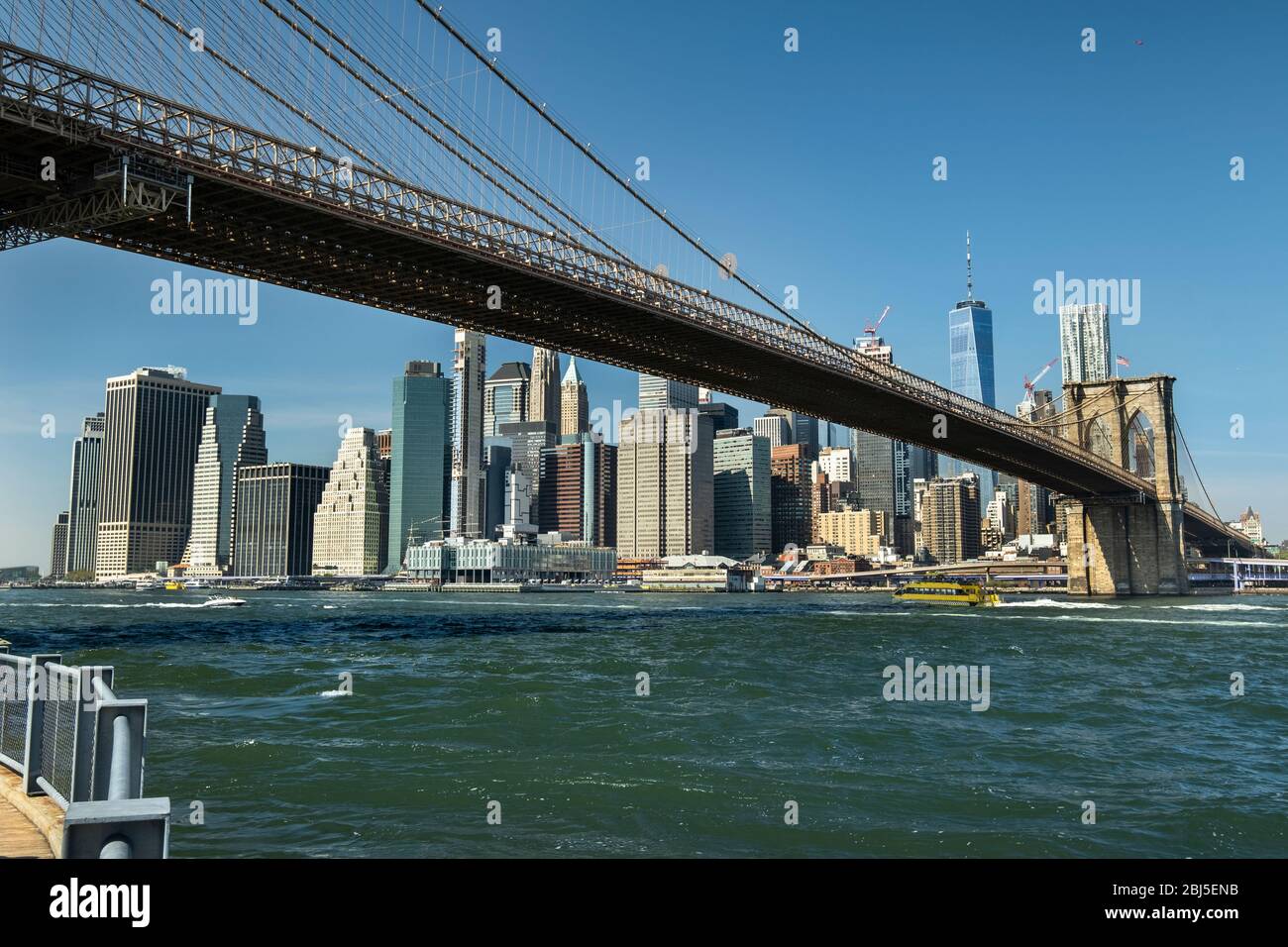 East River shoreline under the Brooklyn Bridge as seen from the DUMBO ...