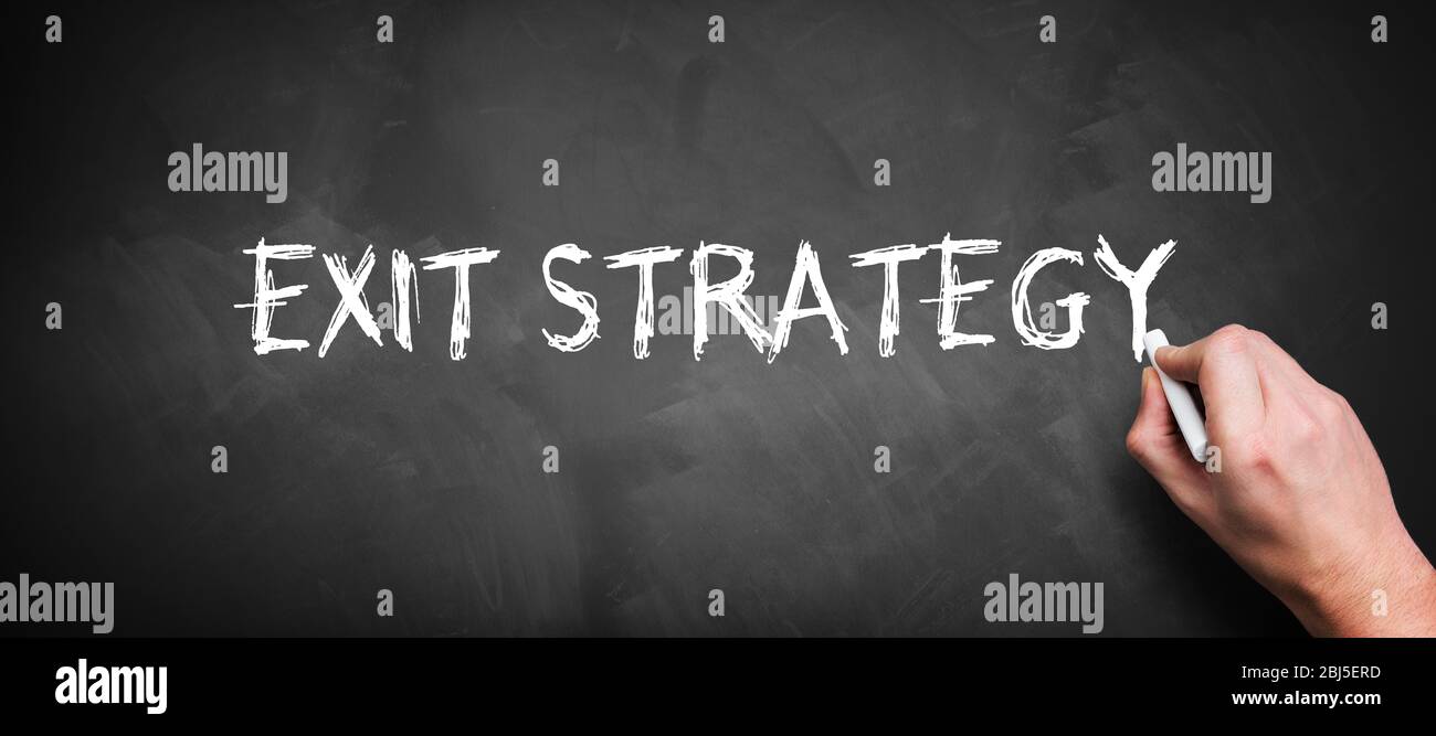 hand writing the message EXIT STRATEGY on a blackboard Stock Photo - Alamy