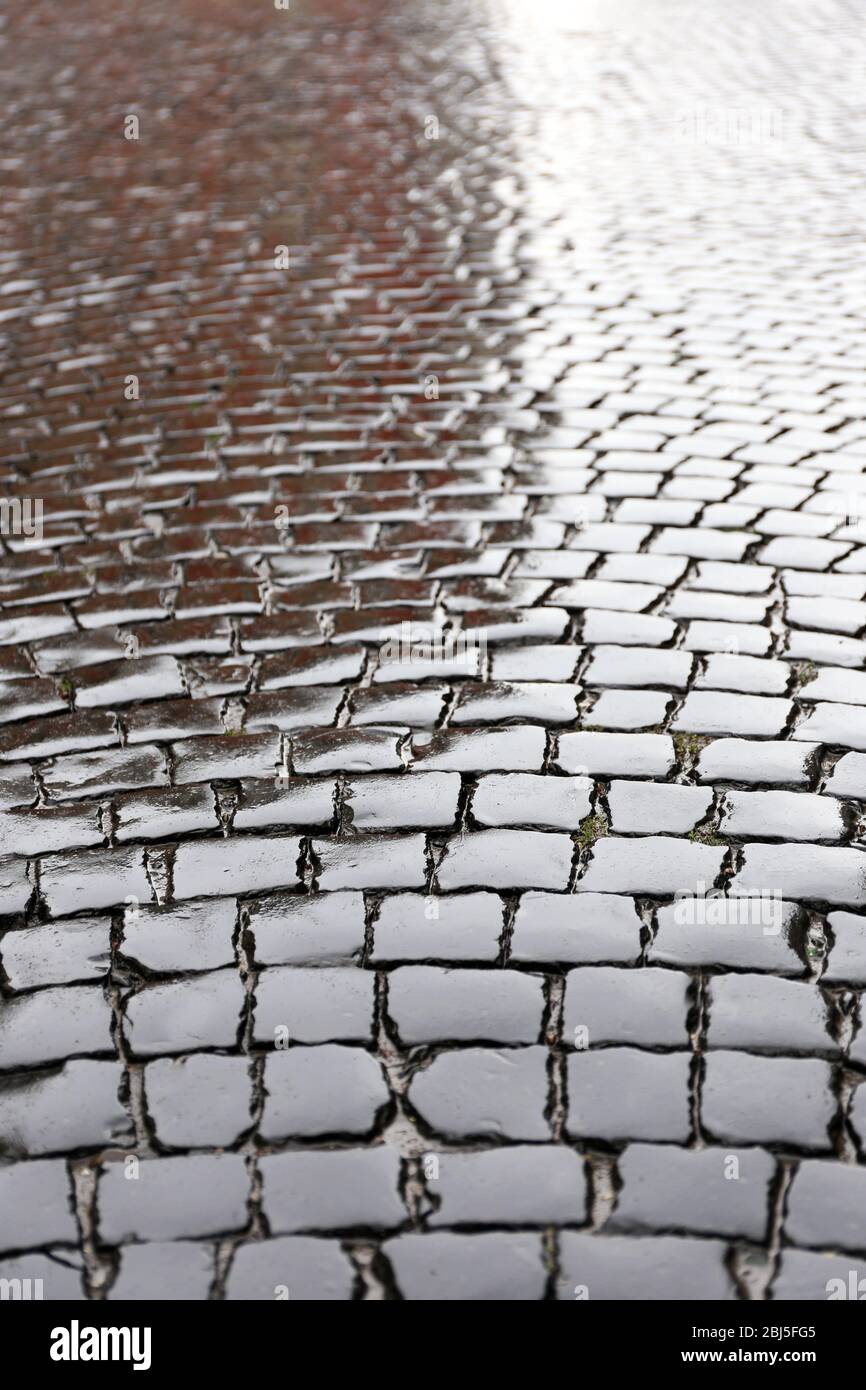Wet stone pavement Stock Photo - Alamy