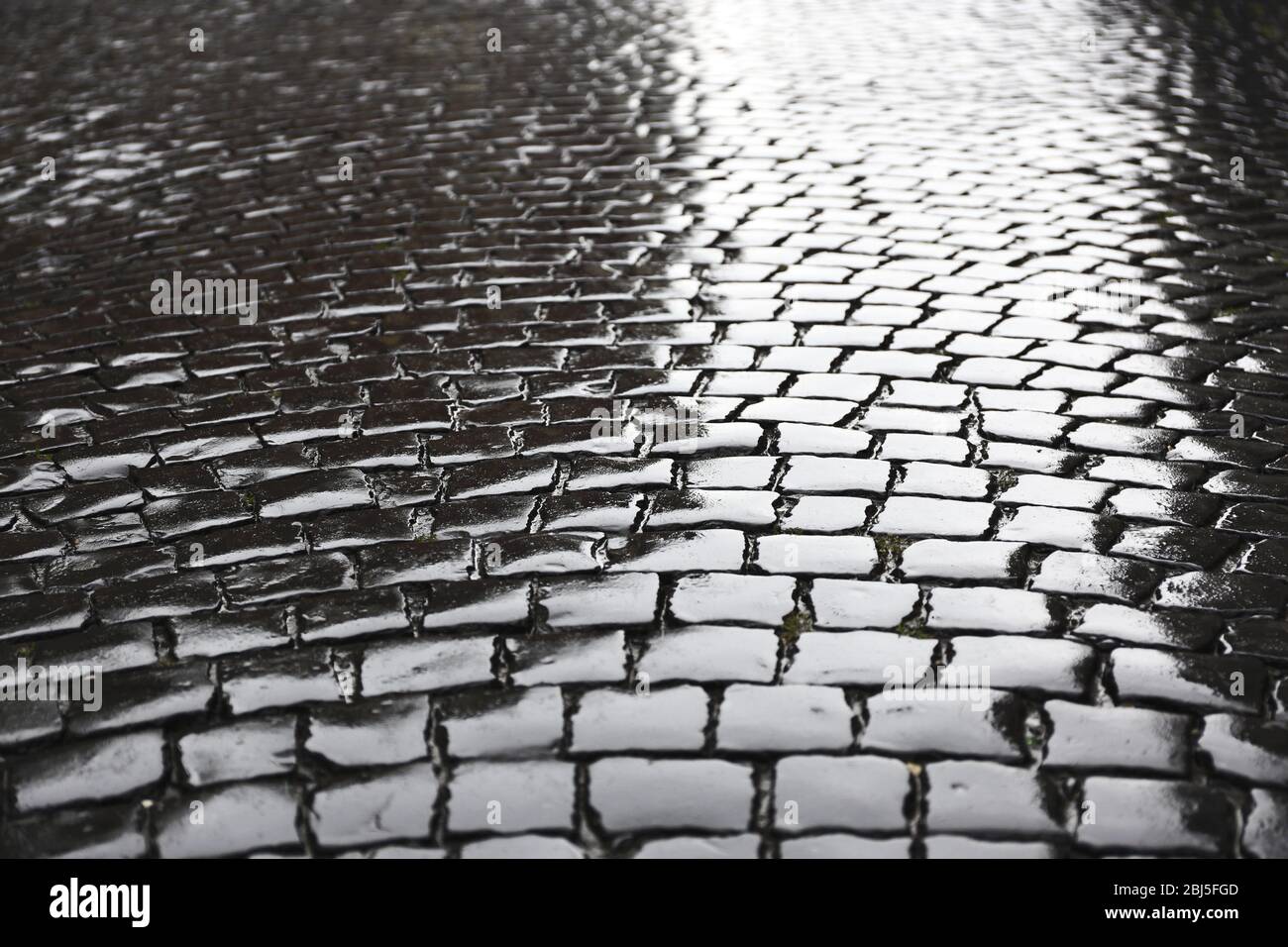 Wet stone pavement Stock Photo - Alamy